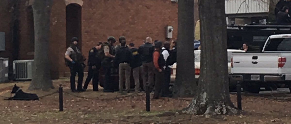 Armed suspect caught after hostage situation at Alabama credit union ...