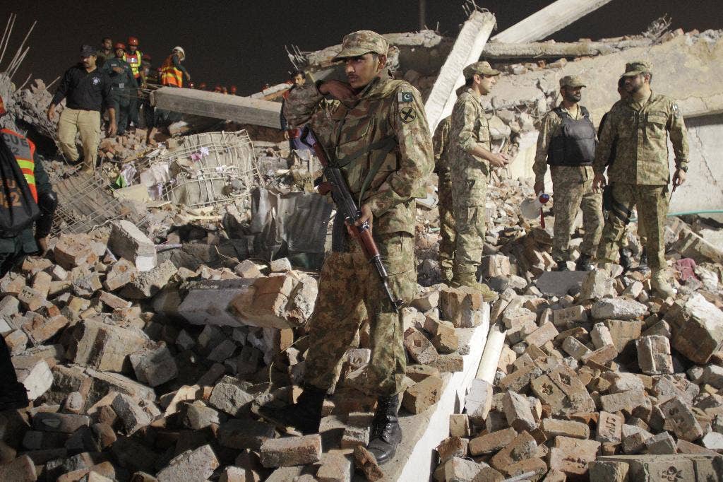 Officials: Death toll in Pakistani factory building collapse rises to ...