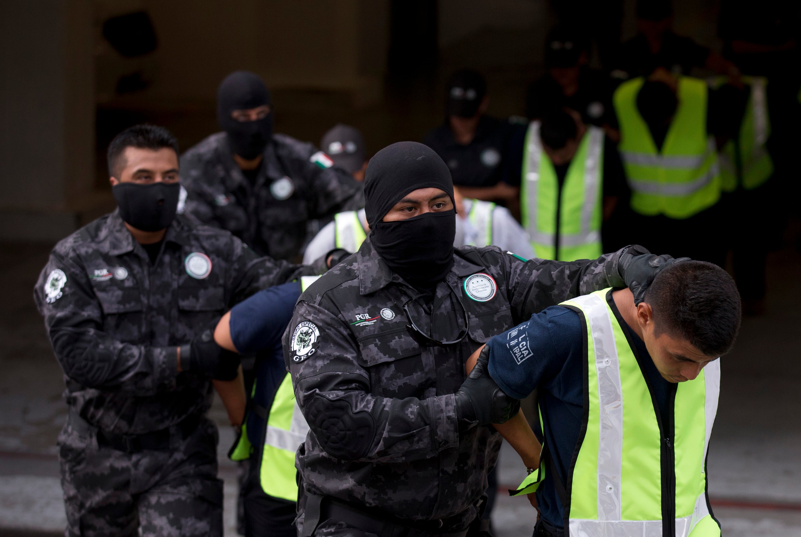 Feds in Mexico take control of 13 police forces with suspected cartel ...