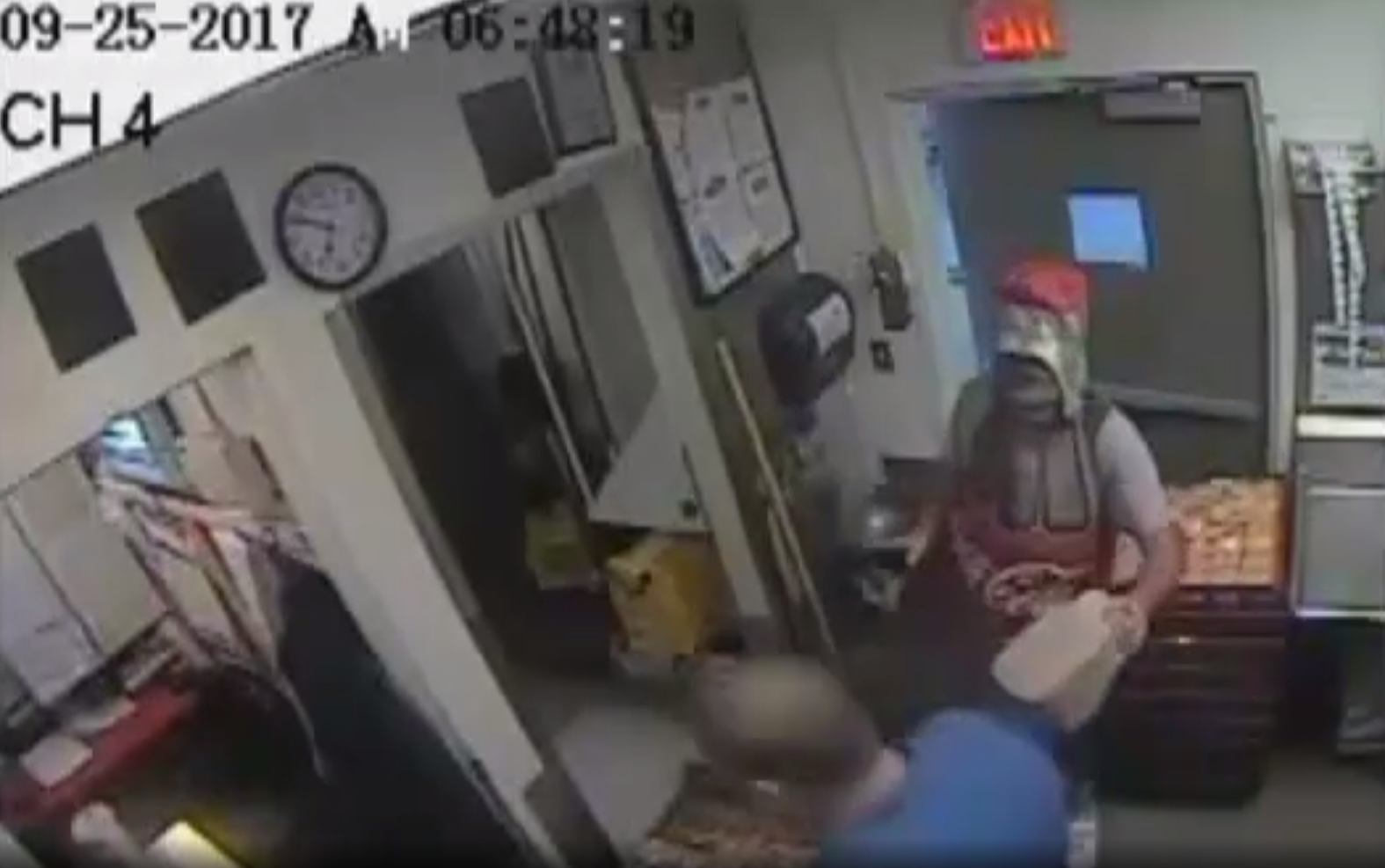 Restaurant robbed by gun-wielding thief in Coca-Cola costume | Fox News