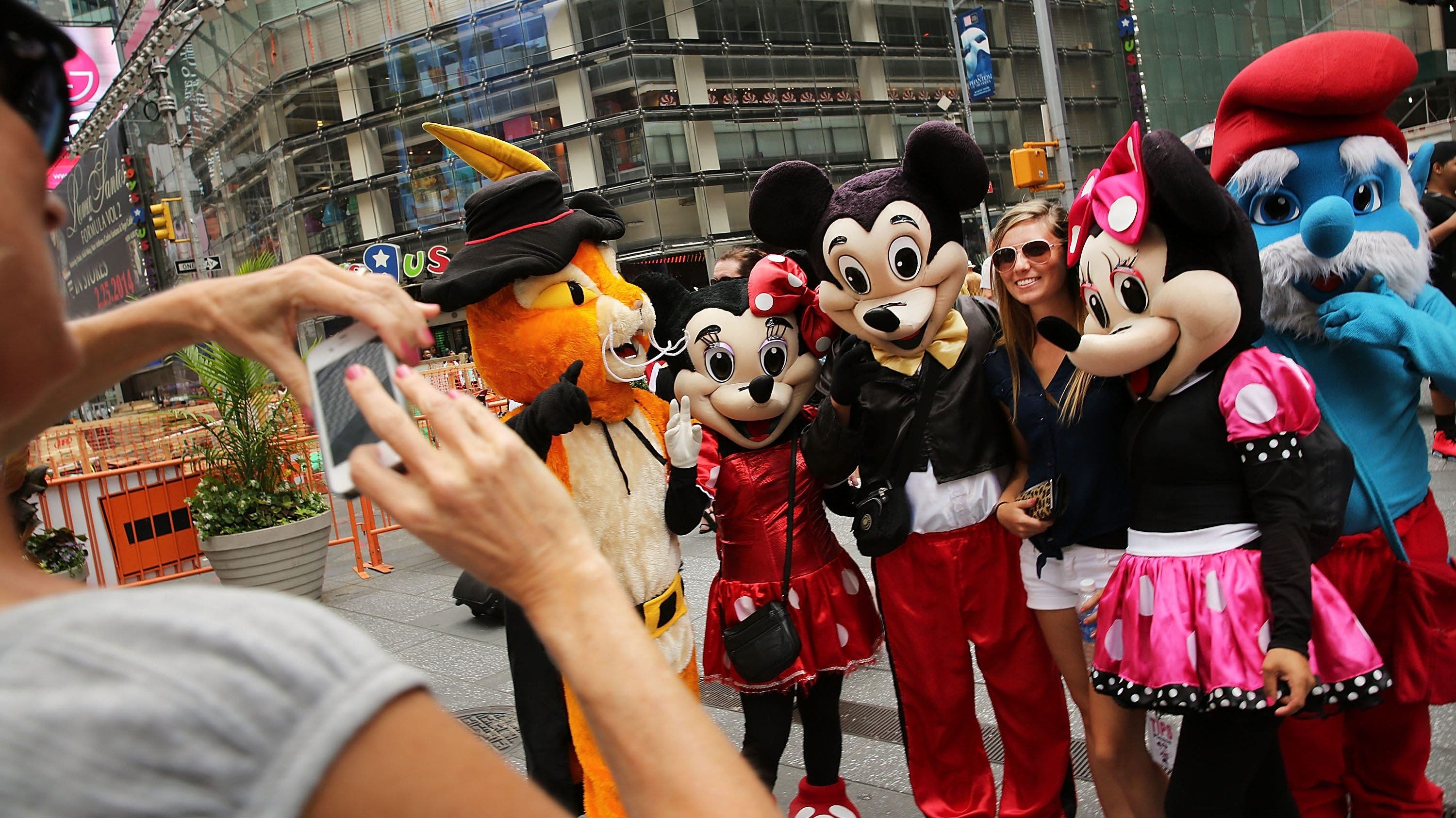 Police Arrest Three More Costumed Characters In New York's Times Square ...