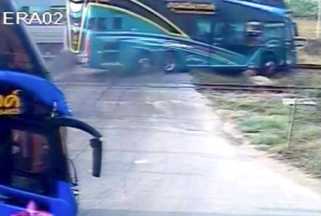Train smashes into double-decker bus in Thailand, killing 3 | Fox News