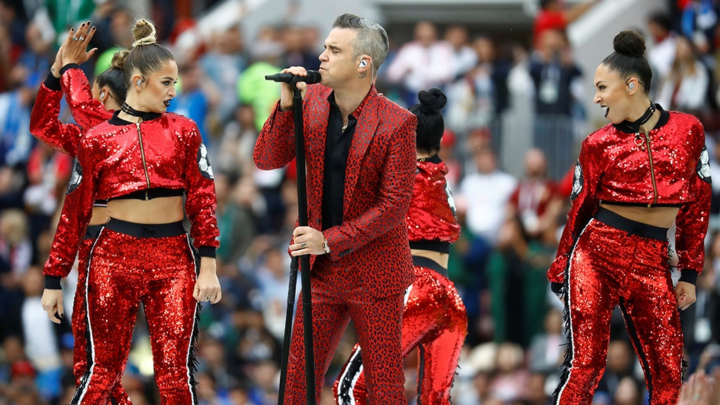Robbie Williams makes vulgar gesture during World Cup opening ceremony ...