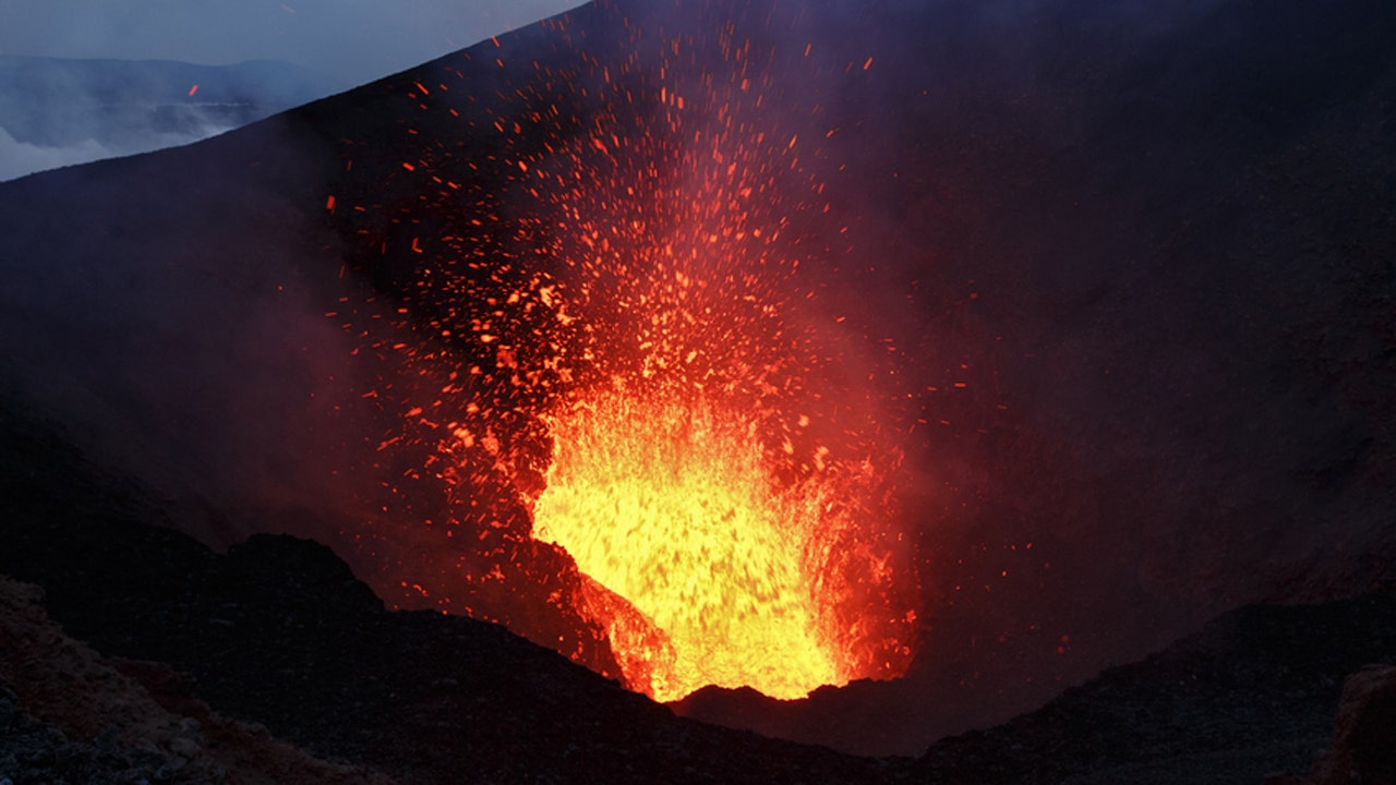 Daring wingsuit jumper flies over active volcano | Fox News