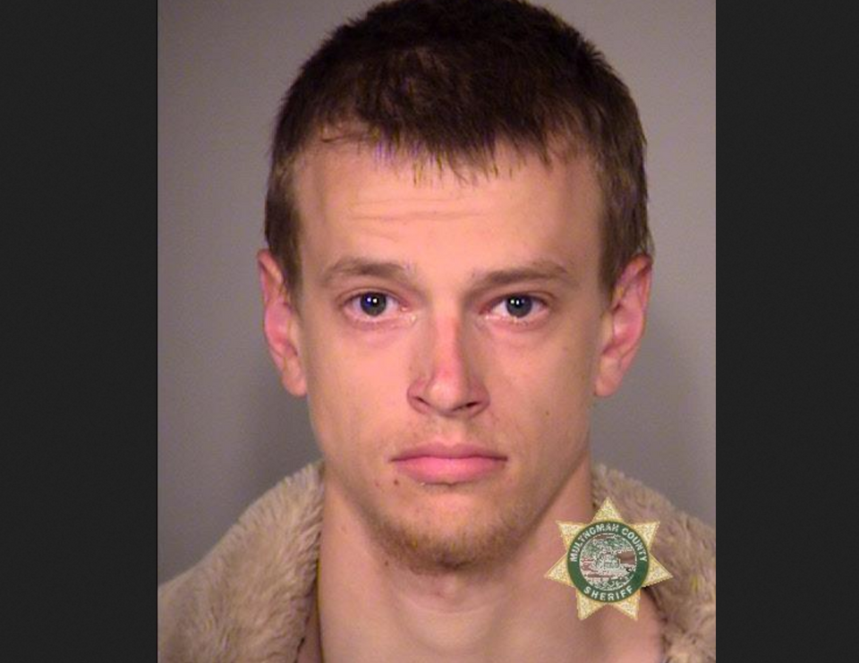 Portland May Day protester pleads guilty after throwing flare into cop ...