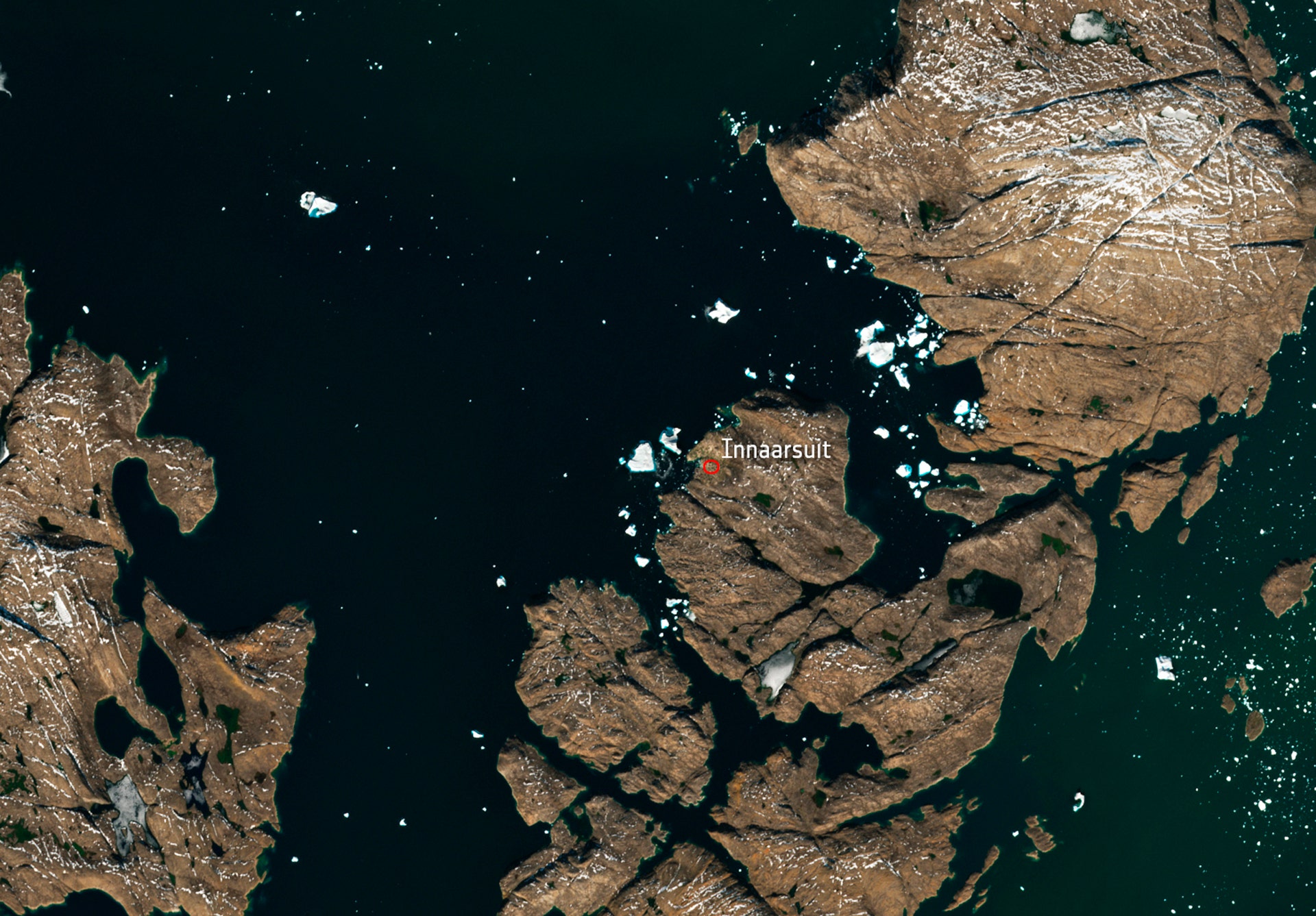 Iceberg looming over Greenland village is spotted from space | Fox News