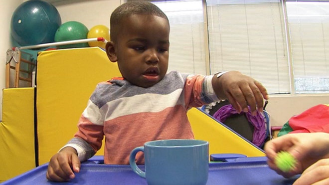 2-year-old boy paralyzed in traumatic birth regains left-arm function ...
