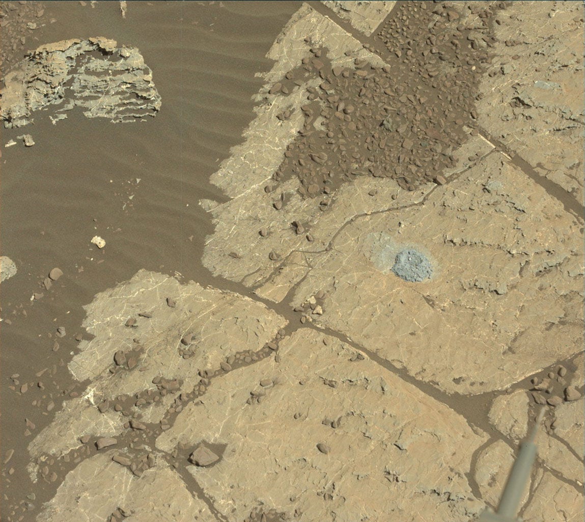The Curiosity rover just drilled into a rock on Mars for 1st time since ...