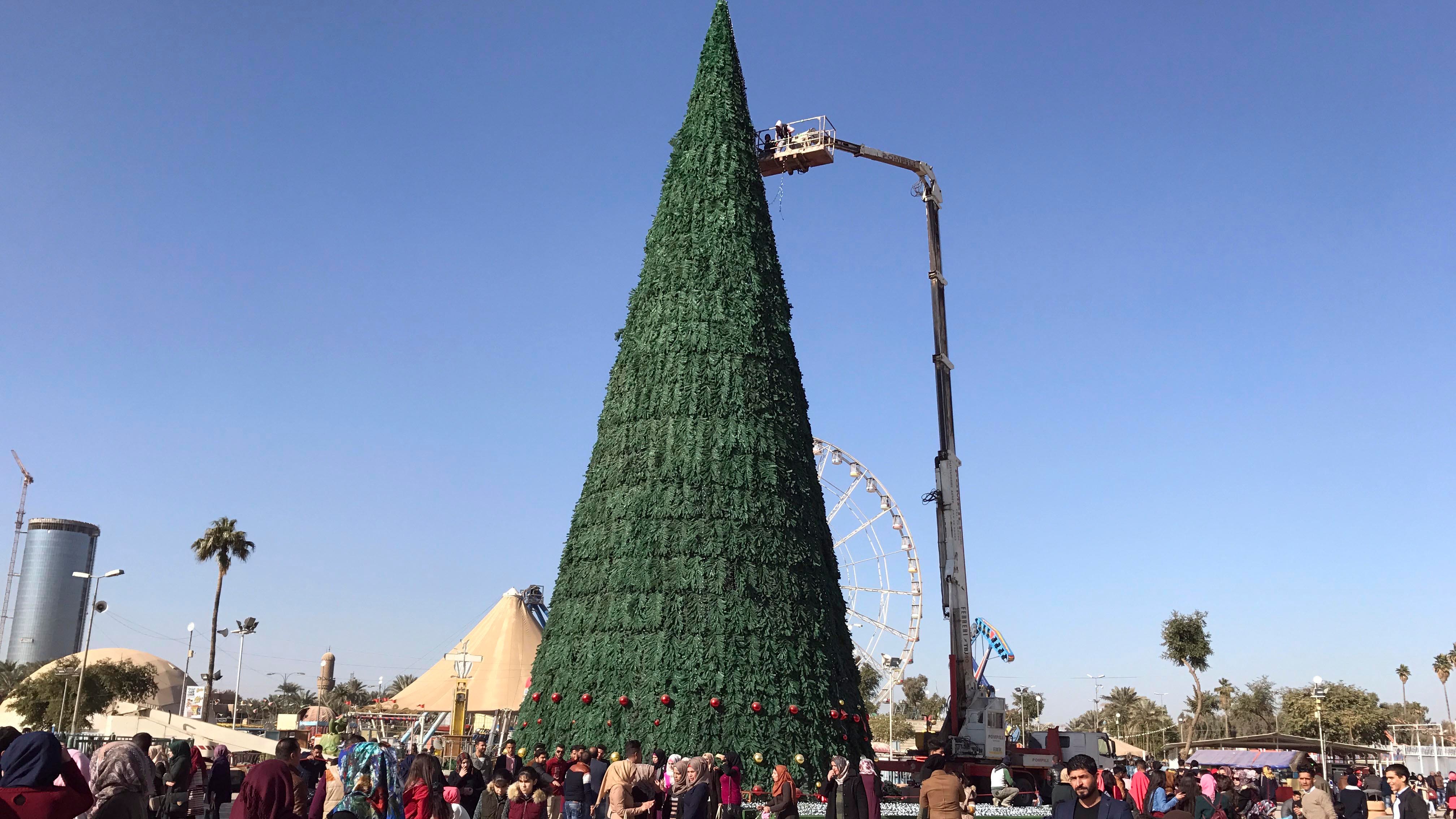 Muslim businessman erects tallest Christmas tree in Baghdad as symbol ...
