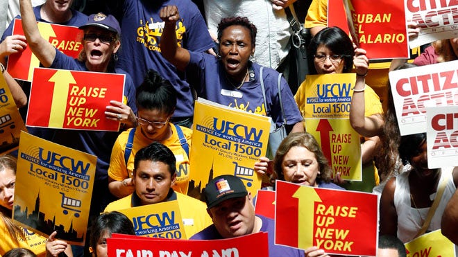 Dozens of states increase minimum wage, as Washington debate over ...