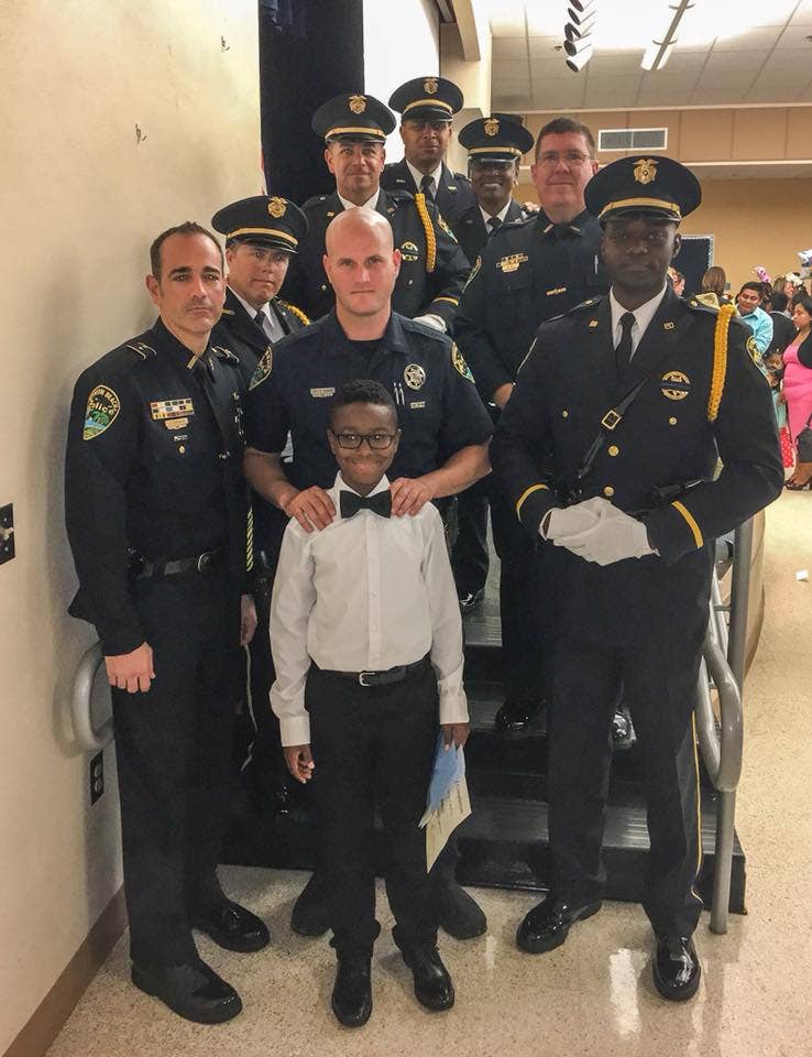 Police Officers Attend Boy S 5th Grade Graduation In Place Of Fallen