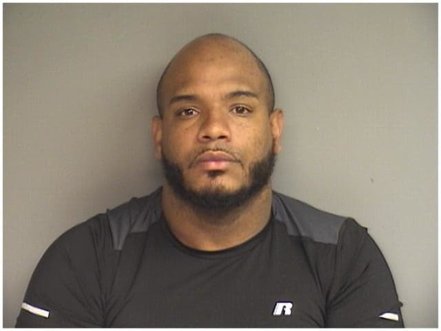 Uber driver arrested after police find guns, drugs in hidden ...