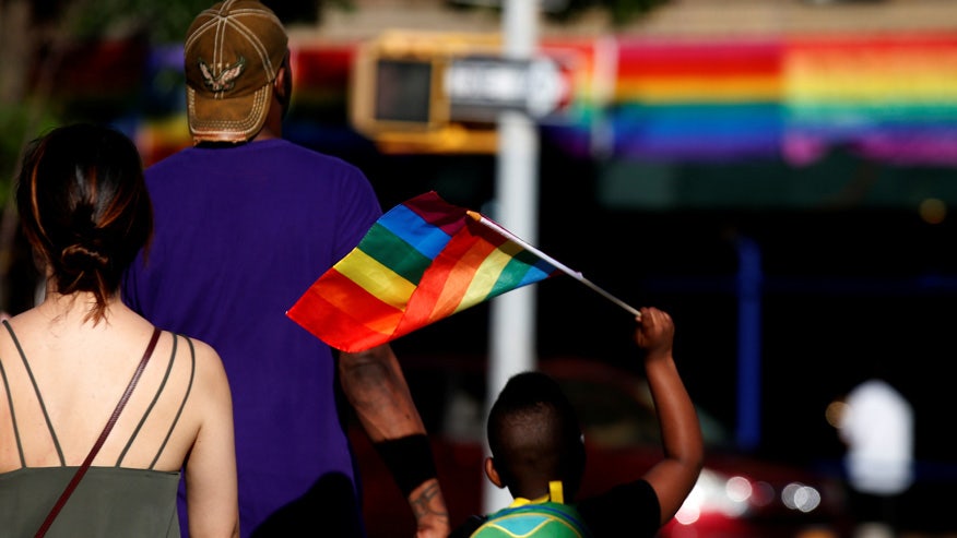 It's okay to decorate a police car with rainbow flags, but not Bible ...