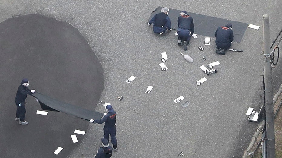 Police officer slashed, security guard shot during rampage in Japan ...