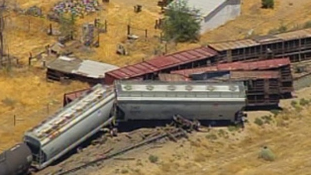 Residents Evacuated After Freight Train Carrying Chemicals Derails in ...