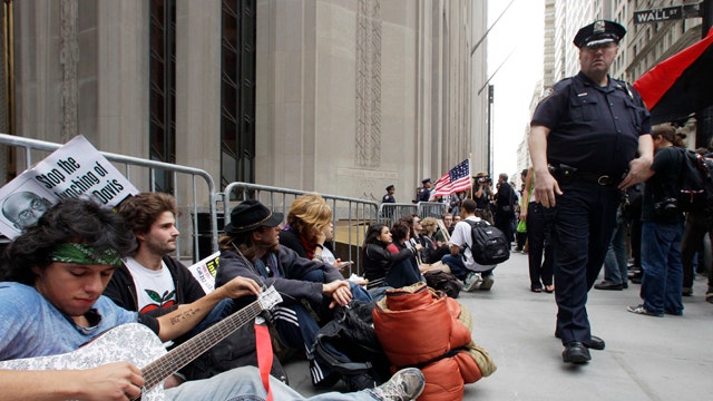 Demonstrators 'Occupy Wall Street' to Protest Influence of Money on U.S ...