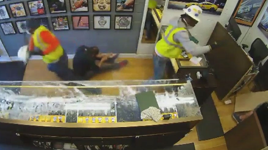 Watch store owner foils robbers by pulling out gun | Fox News
