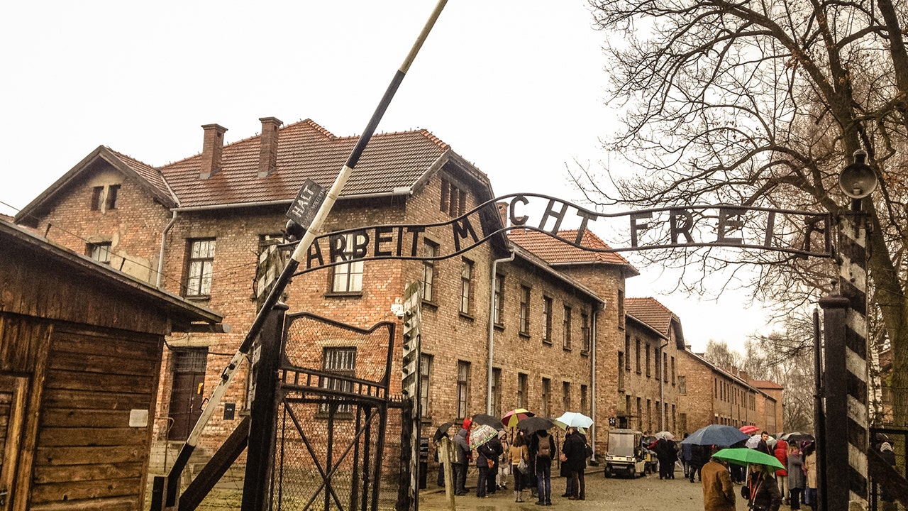 Auschwitz Memorial Shares Photos Of People Walking On Train Track Auschwitz Memorial Shares Photos Of People Walking On Train Track