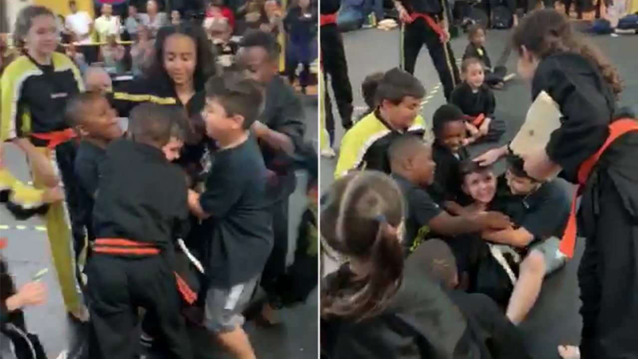 Little boy, cheered on by karate classmates, finally breaks board in ...