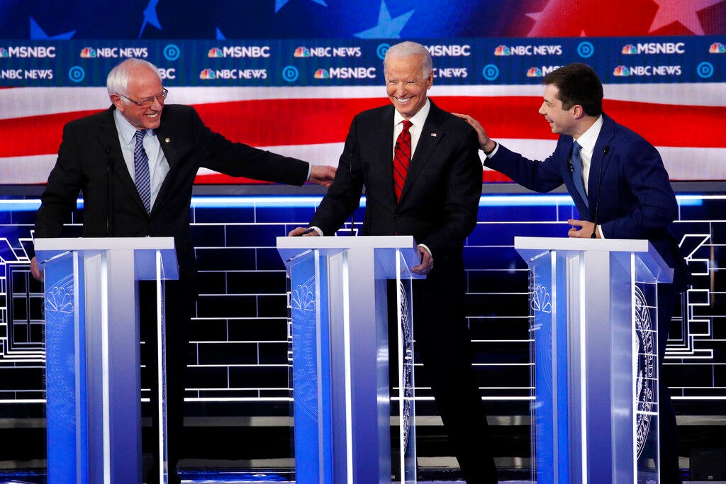 Bloomberg under siege at chaotic debate debut, as Warren attacks field ...