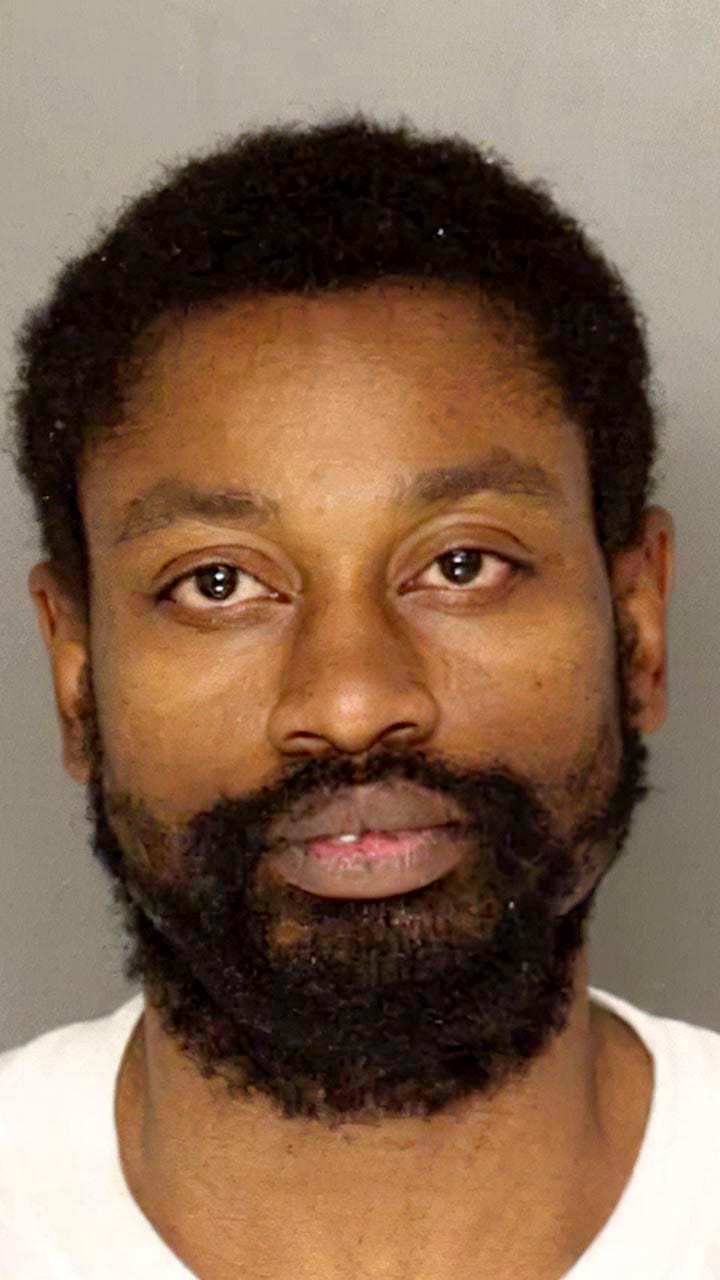 Man charged with homicide after body with multiple stab wounds found ...