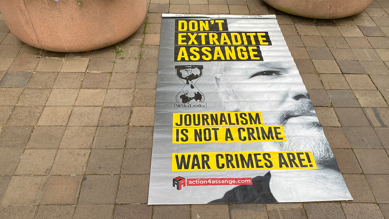 Supporters of Julian Assange rally at Justice Dept. on 4-year ...