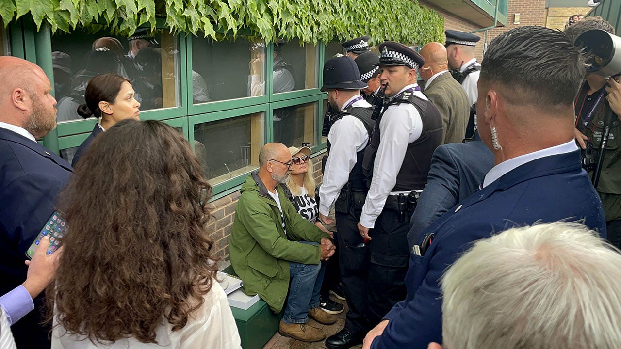 Wimbledon protesters arrested after delaying play with climate change ...