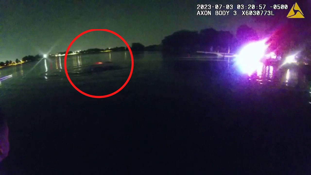 Texas Police Rescue Woman From Submerged Car Administer Life Saving