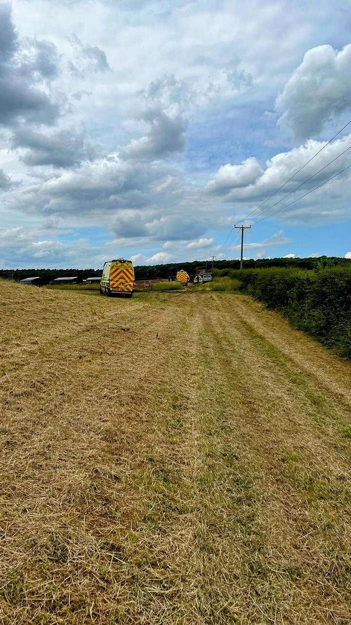 Farmer nearly crushed by huge bale of hay is saved by father of two ...
