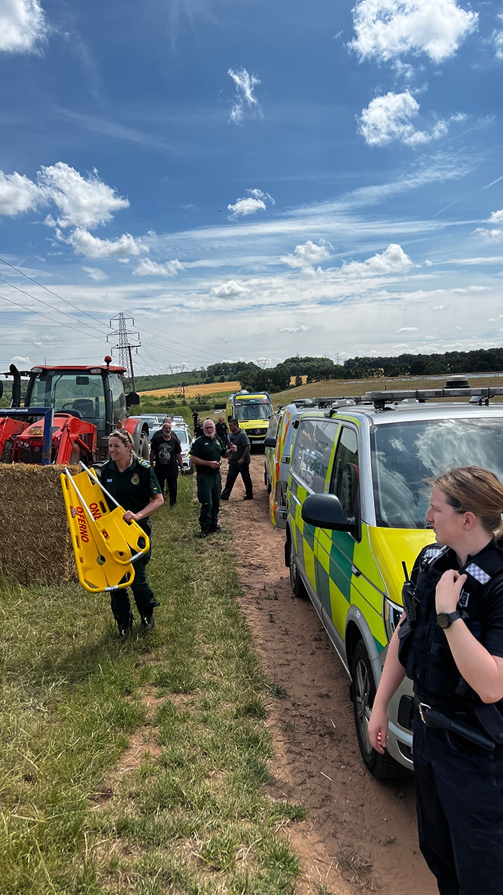 Farmer nearly crushed by huge bale of hay is saved by father of two ...